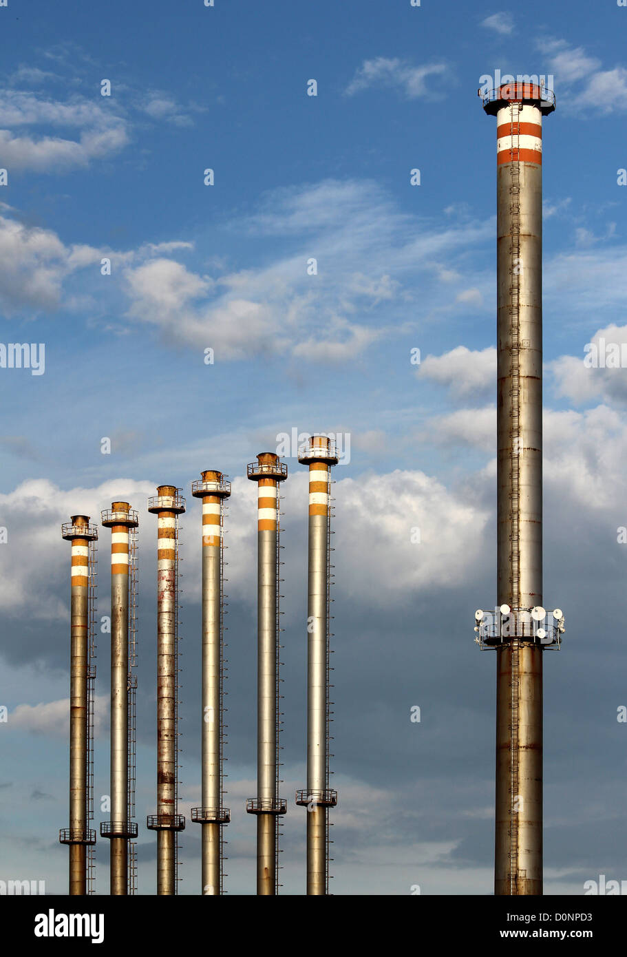 group of steel factory chimney Stock Photo - Alamy