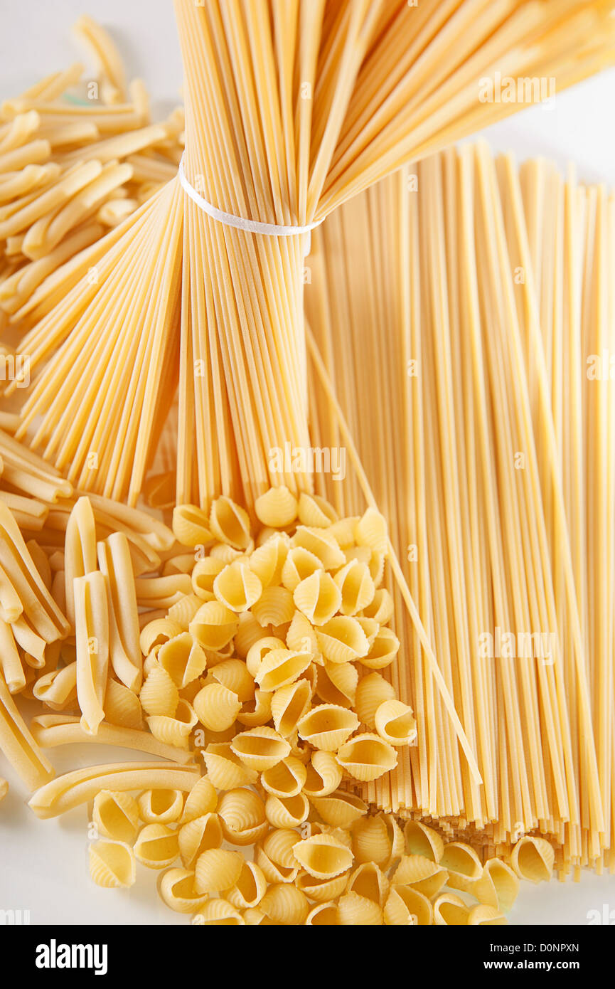 A bunch of wholegrain yellow spaghetti pasta Stock Photo - Alamy