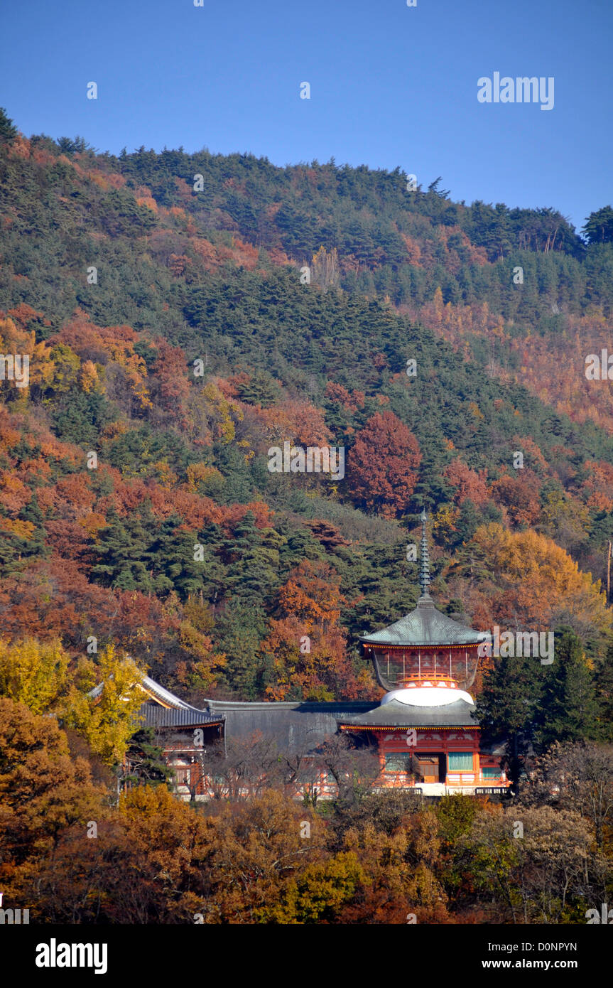 The ash repository Unjoden, surrounded by autumn foliage, Nagano, Japan ...