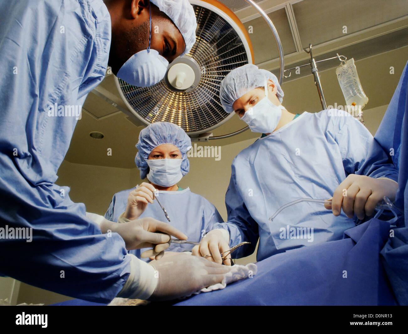 Physicians and Nurse Perform Abdominal Surgery Stock Photo - Alamy