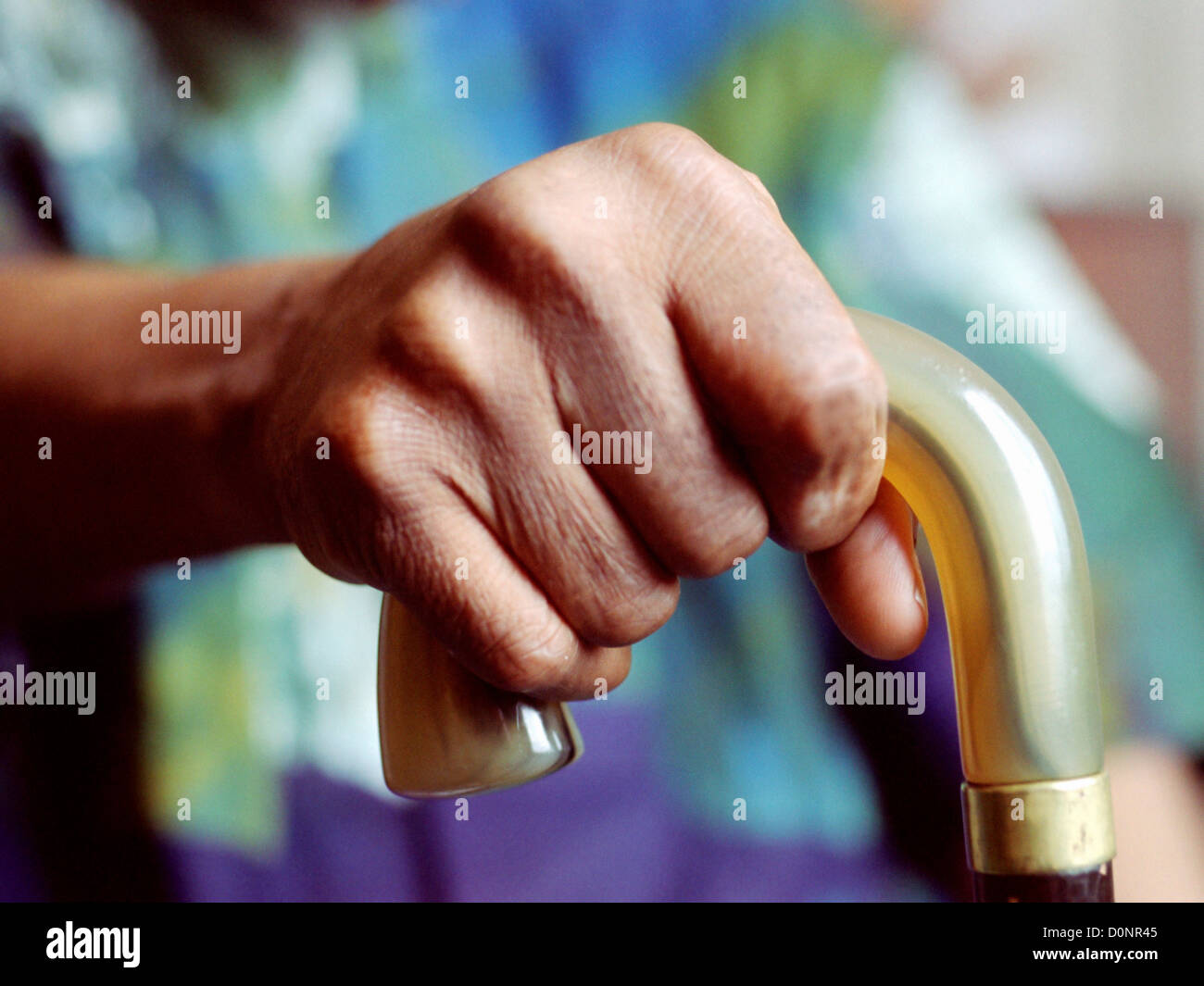 Senior Hand on Cane, Close-up Stock Photo - Alamy