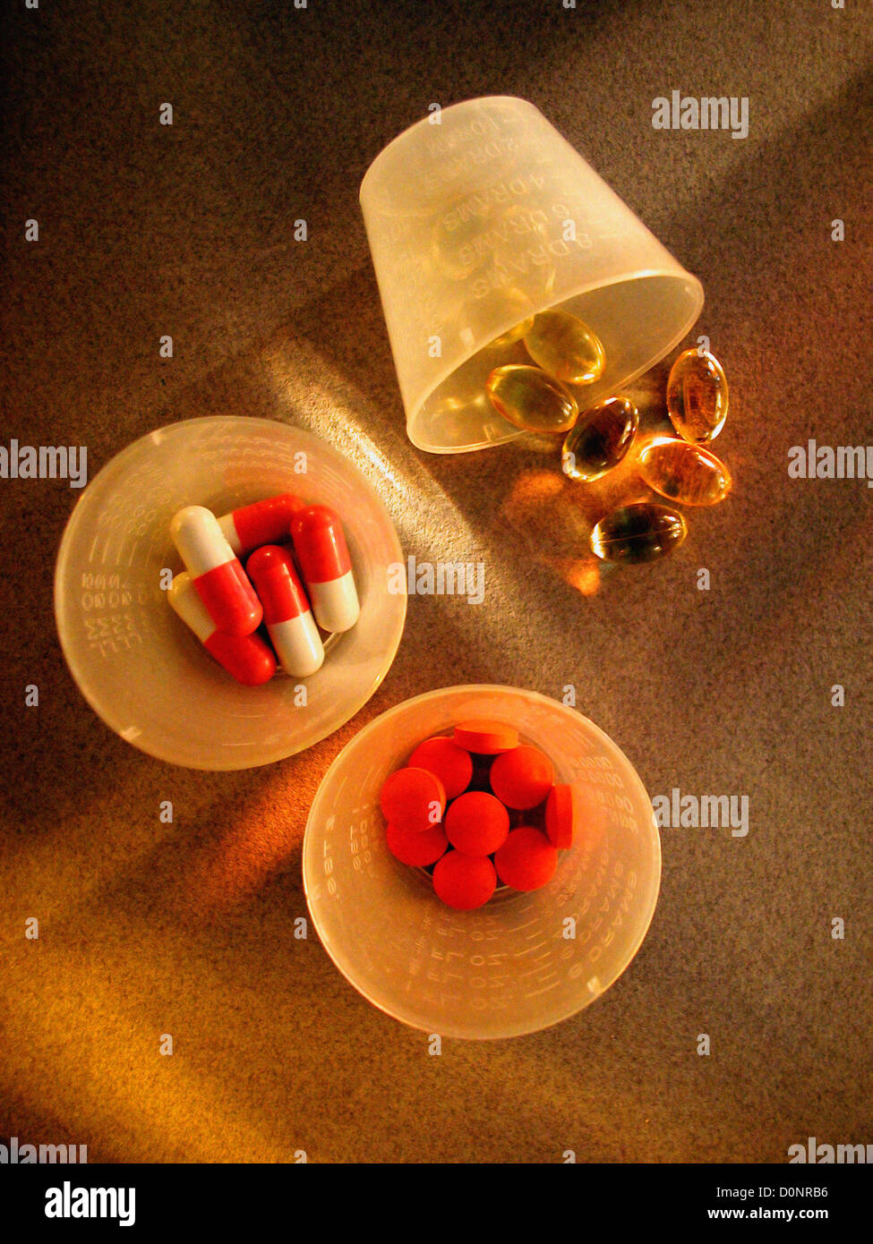Dispenser Cups with Medicine Stock Photo - Alamy