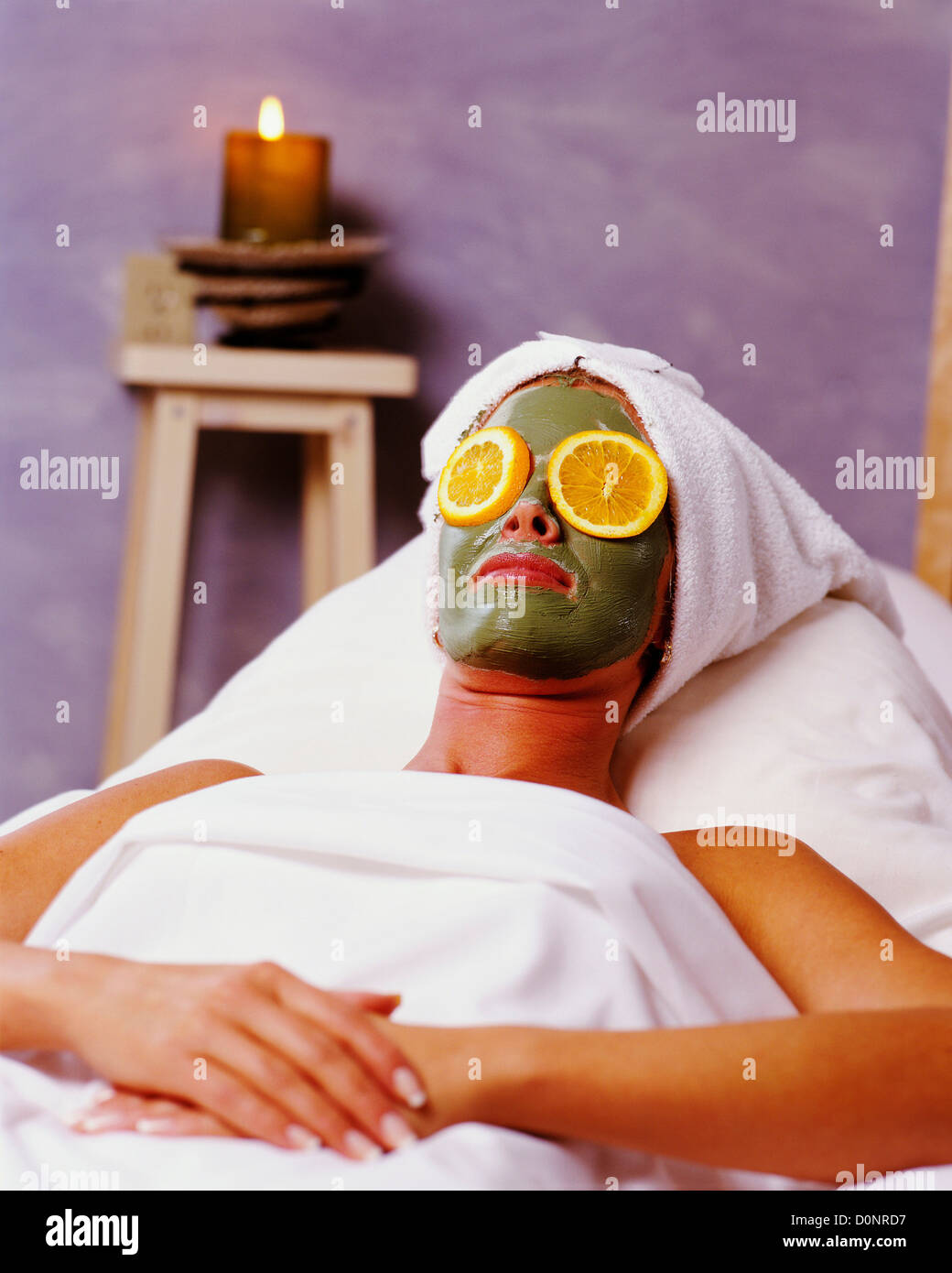 Woman Relaxing During Facial Treatment Stock Photo - Alamy