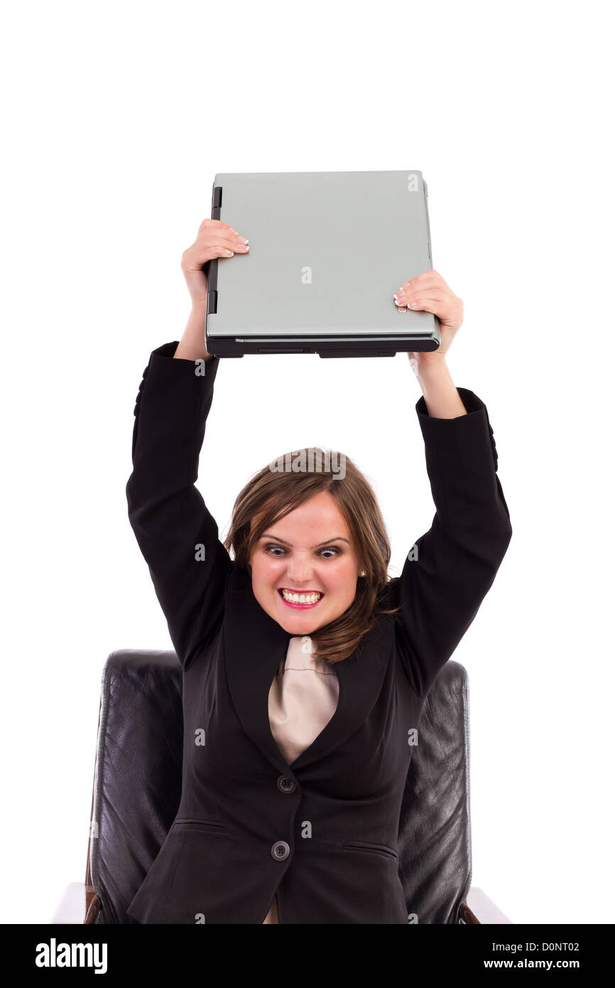 Angry businesswoman throwing her laptop on white Stock Photo - Alamy