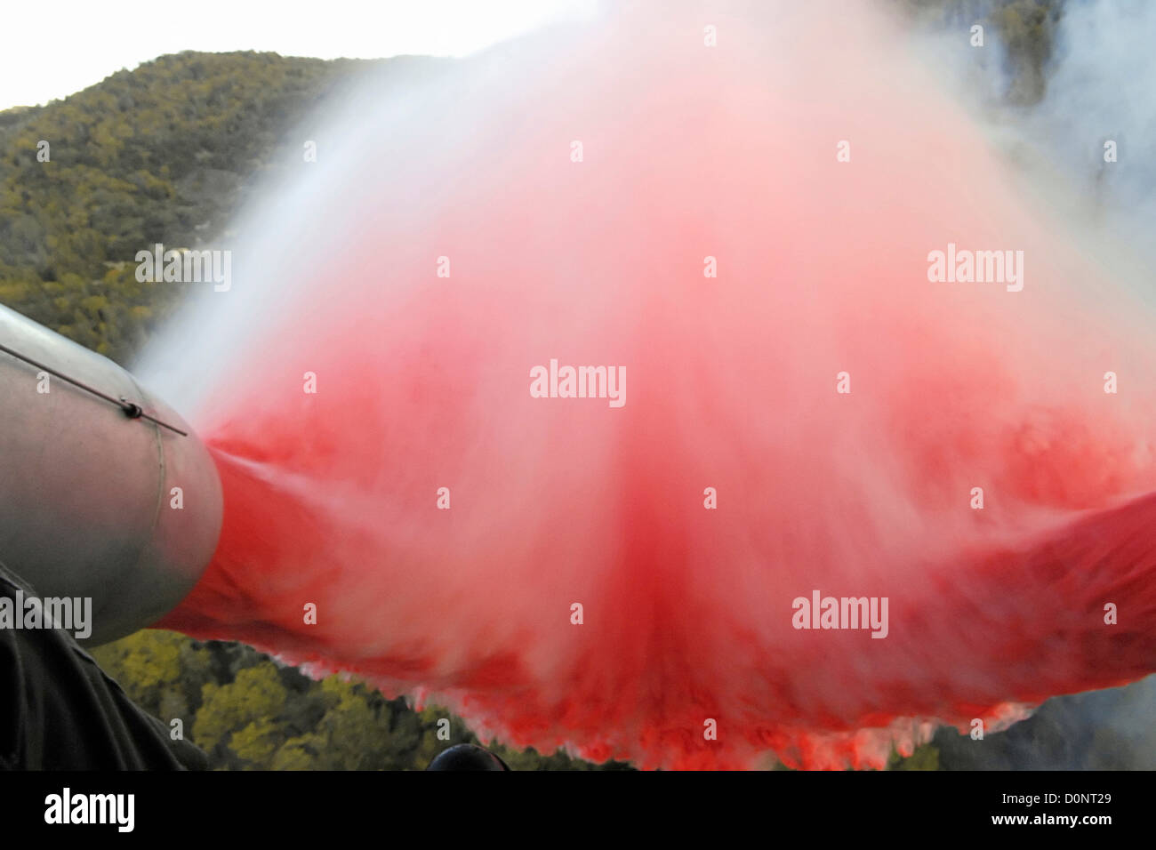 C-130 Dropping Fire Retardant Stock Photo - Alamy