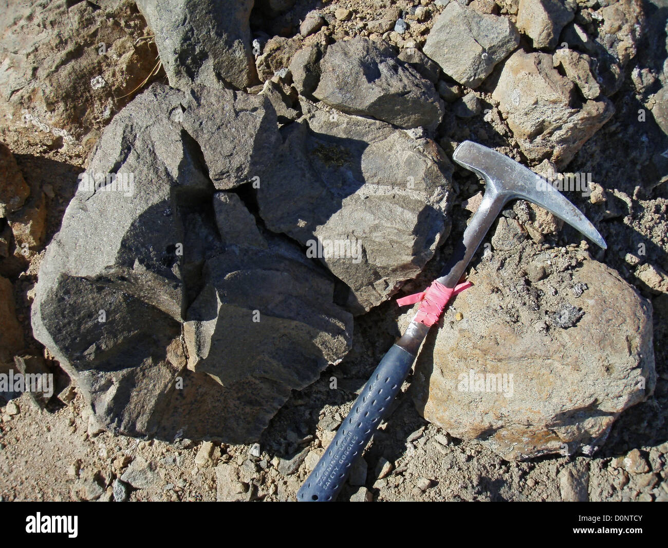 Geological Hammer and Igneous Rock Stock Photo - Alamy