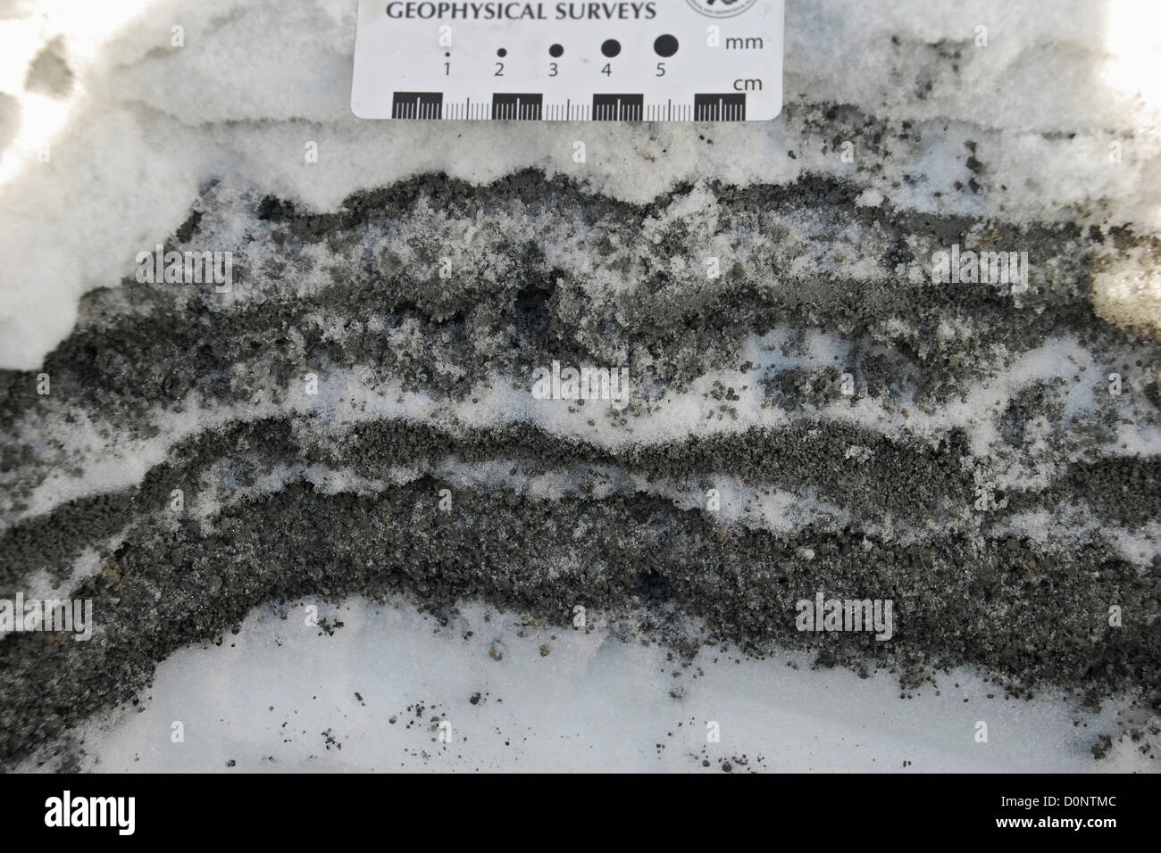 Alternating layers tephra or ashfall snow research hut on Mount Redoubt ...