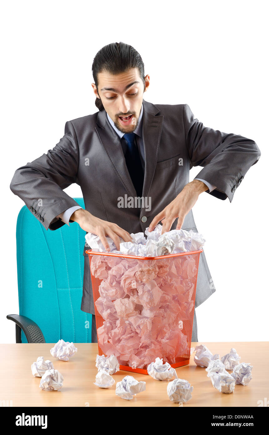 Man with lots of wasted paper Stock Photo - Alamy