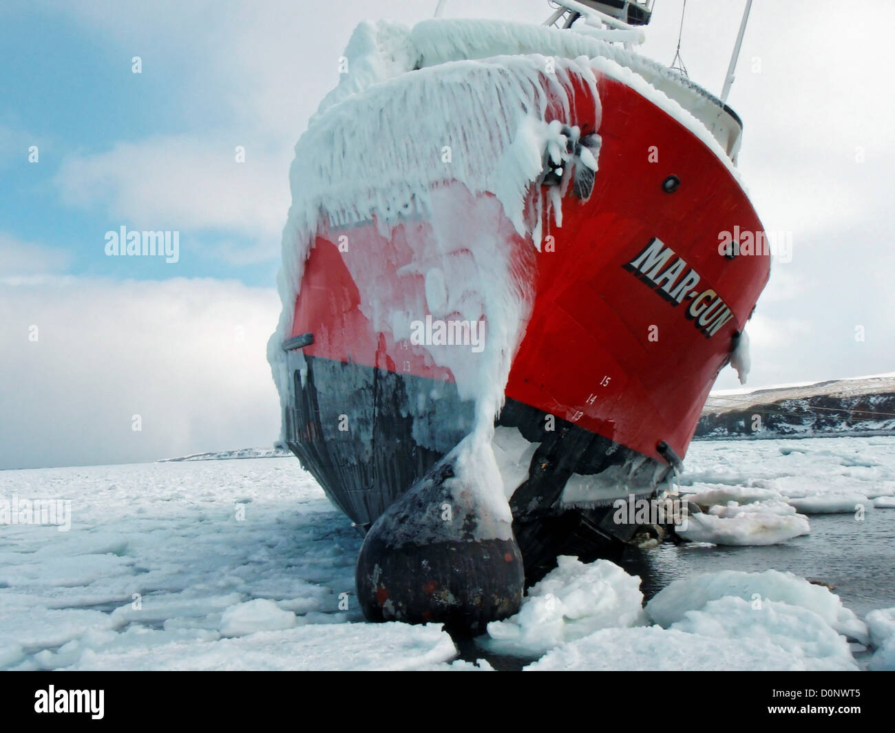 The grounded fishing vessel Mar-Gun under heavy icing. Mar-Gun grounded ...
