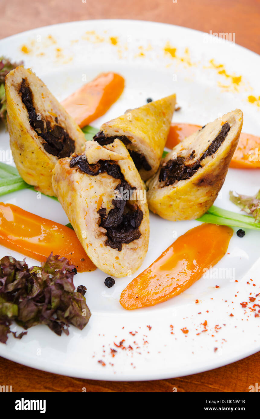 Meat and vegetable roll in plate Stock Photo - Alamy
