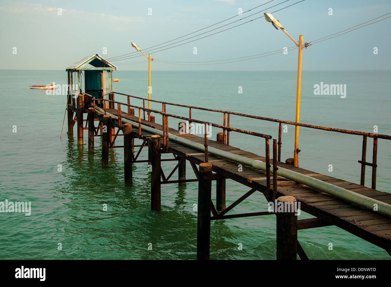 A view of a pier looking out into the ocean Stock Photo - Alamy