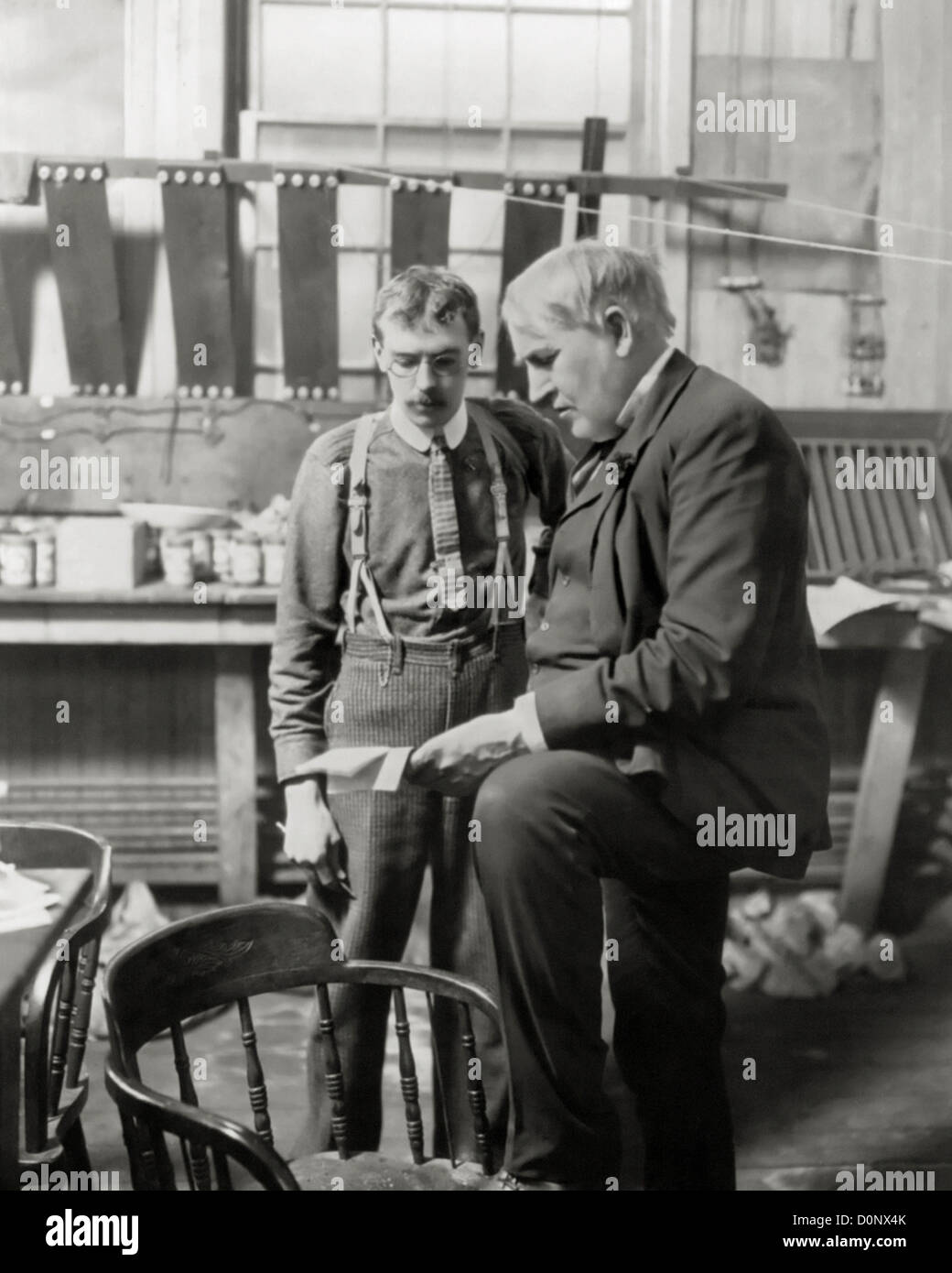 Inventor Thomas Edison and Assistant in Chemical Laboratory Stock Photo ...