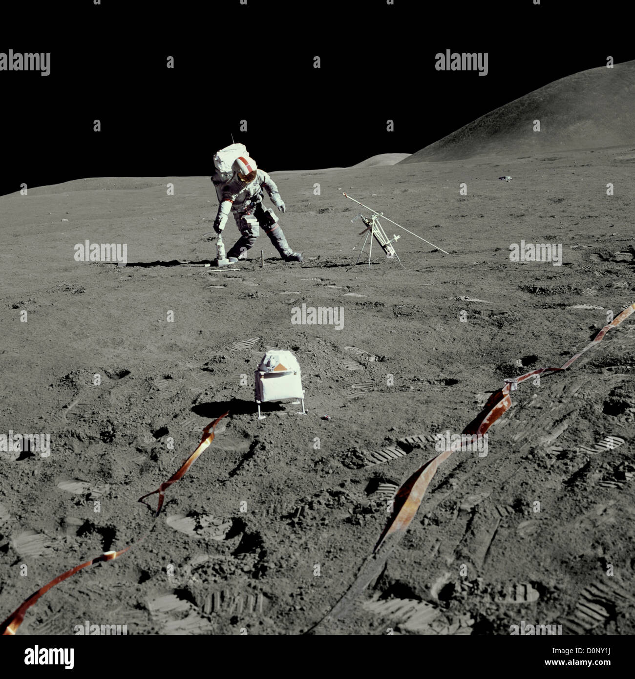 An Apollo 15 Astronaut Prepping Science Equipment on the Moon Stock ...