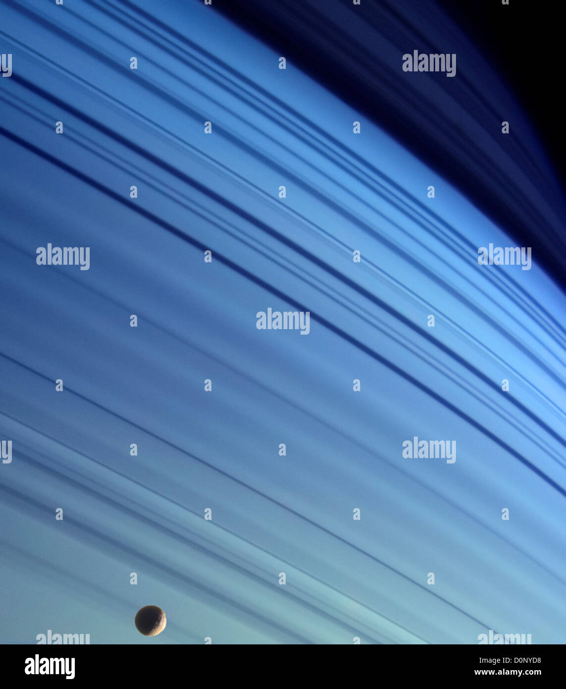 Mimas and Ring Shadows Against Saturn Stock Photo - Alamy