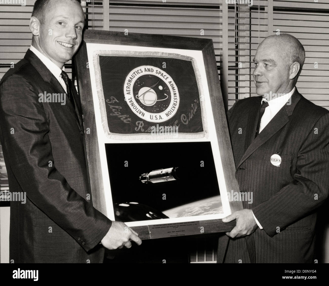 Neil Armstrong Presenting Flag Stock Photo - Alamy