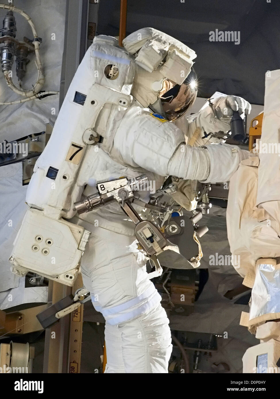 Astronaut Working on International Space Station Stock Photo - Alamy