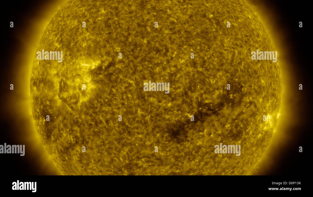 The dark coronal hole in Sun's lower region is 'open' magnetic area ...