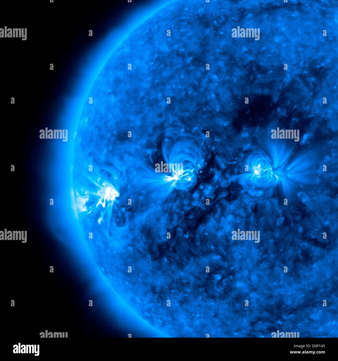 A line loop-producing regions line up on Sun. bright area on left was ...
