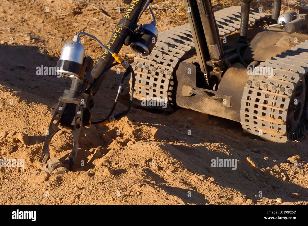 Bomb Disposal Robot Digging for IED Stock Photo - Alamy