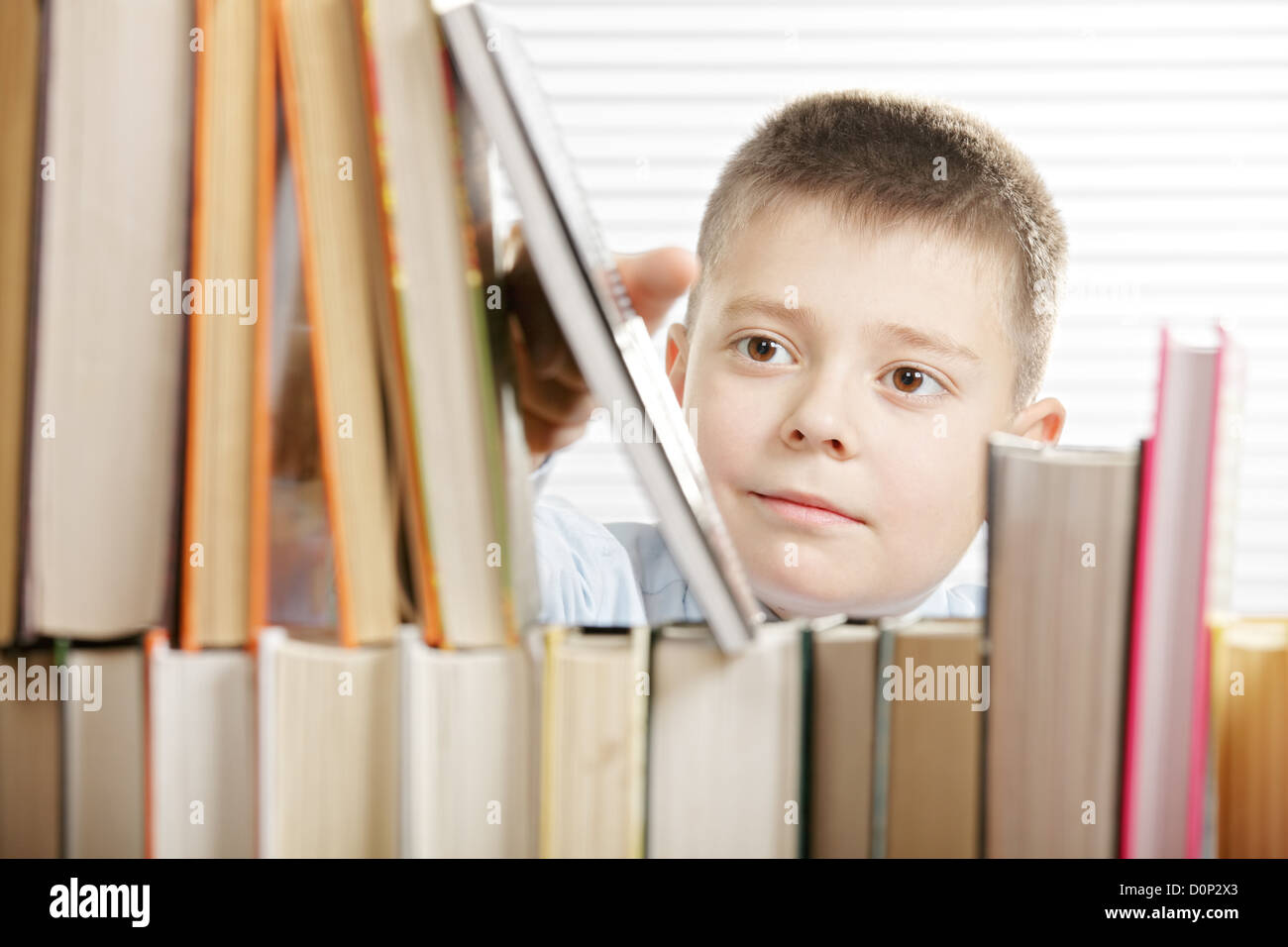Student taking book Stock Photo - Alamy