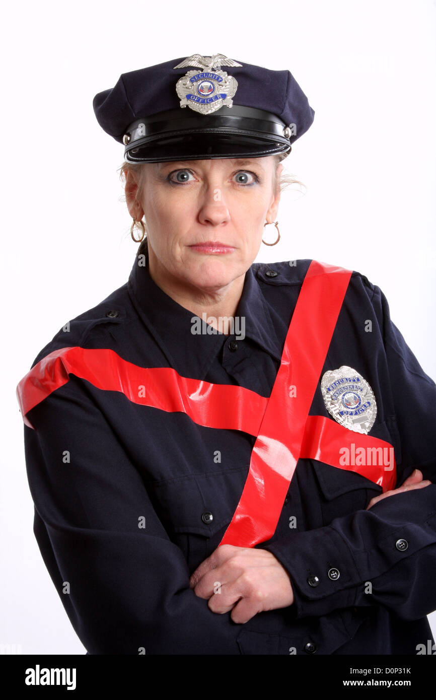 A woman security officer wrapped in red tape Stock Photo - Alamy