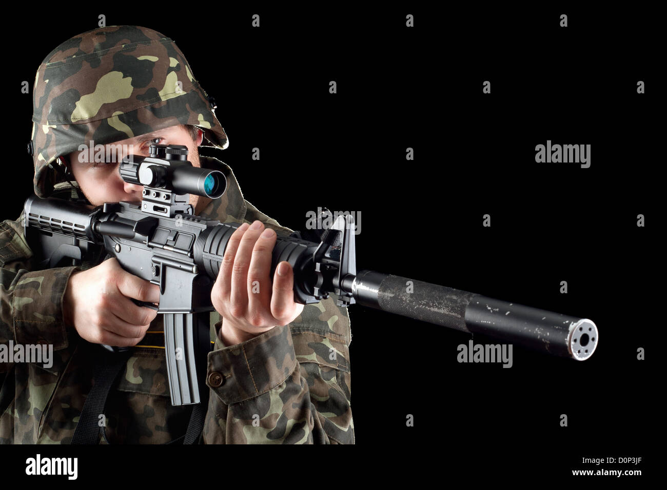 Armed man taking aim Stock Photo - Alamy