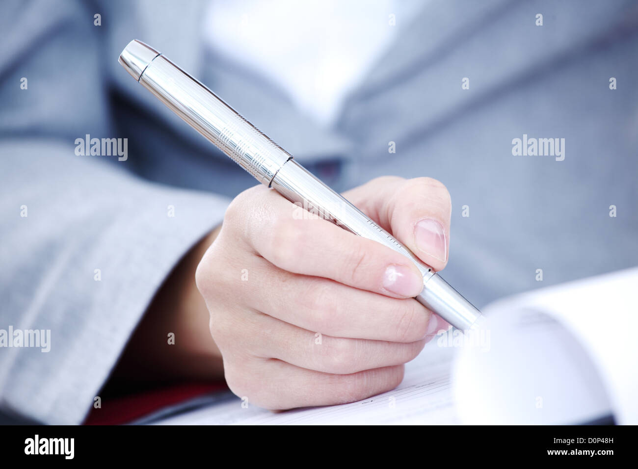woman write by pen on paper Stock Photo - Alamy