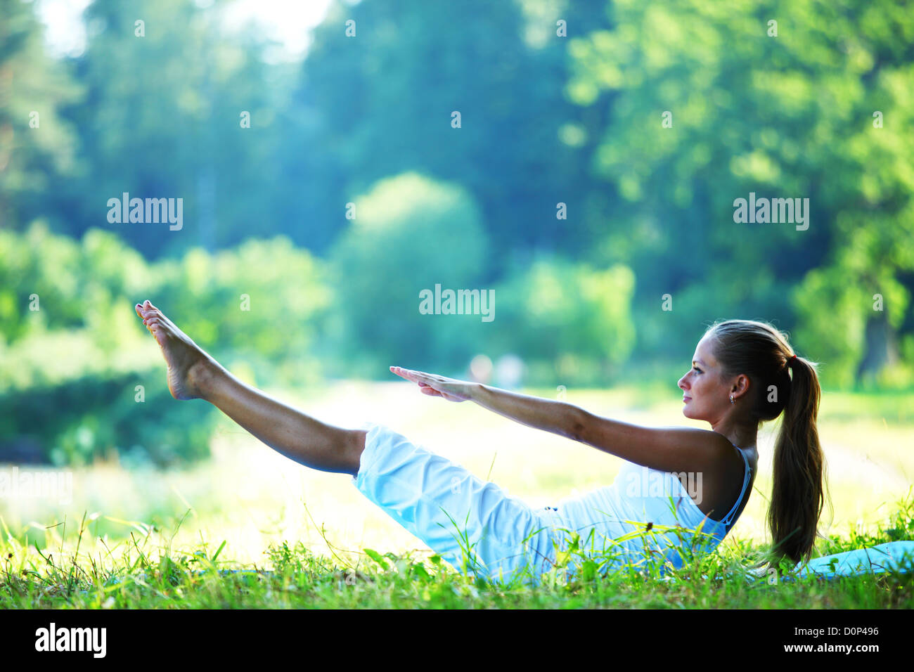 woman lay and training on ground Stock Photo - Alamy