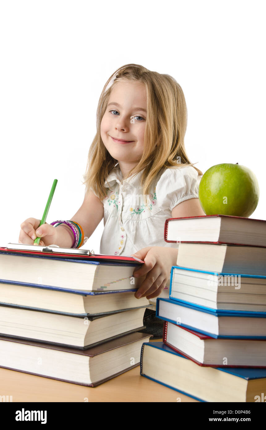Little girl with books on white Stock Photo - Alamy