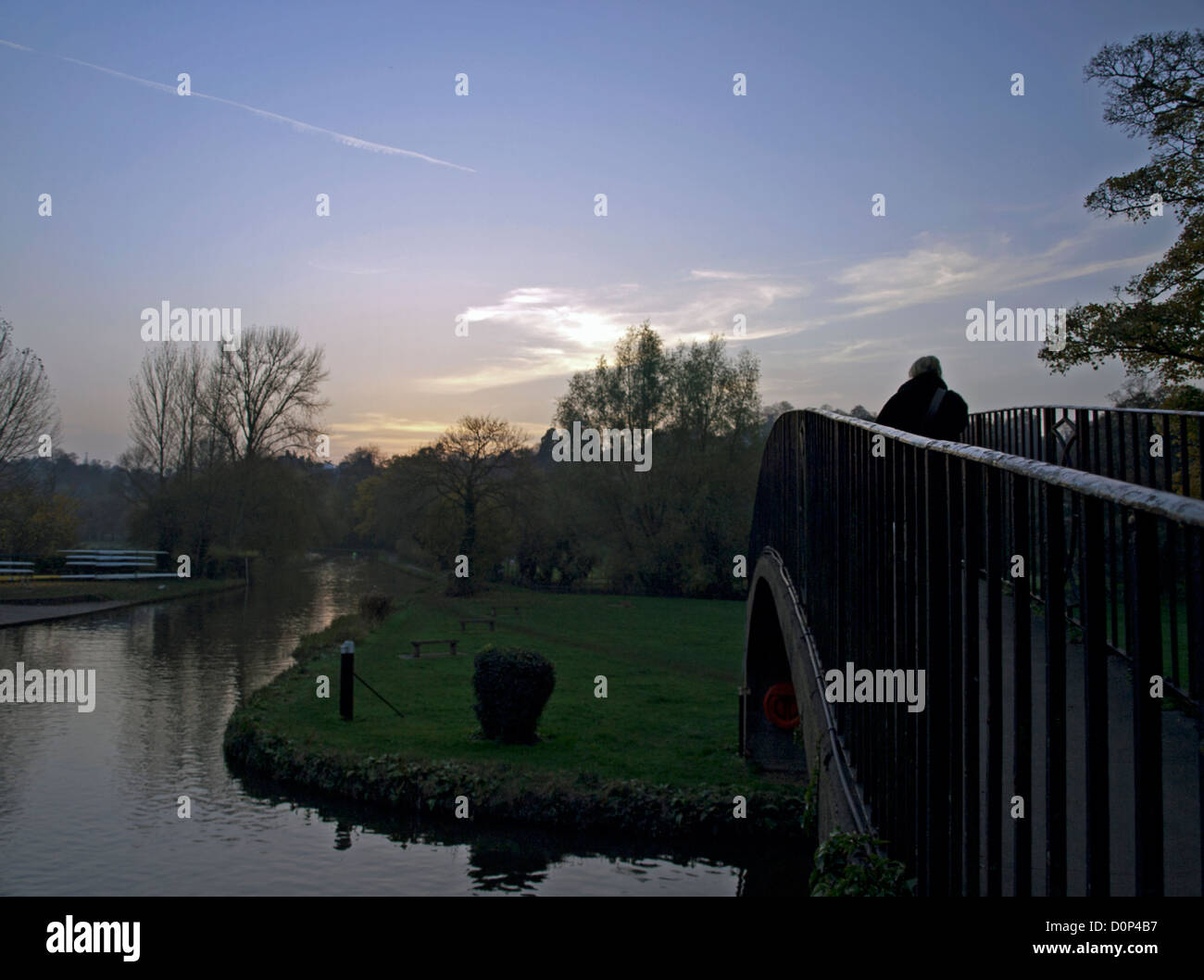 Sunset view of the River Wey a tributary of the River Thames showing ...