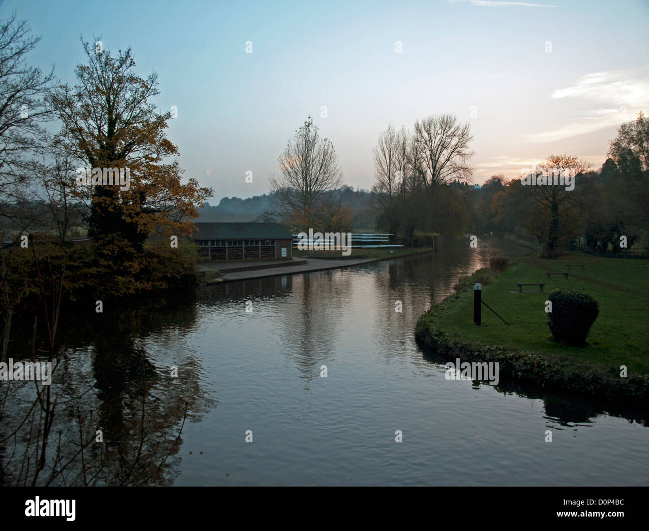 Sunset view of the River Wey, a tributary of the River Thames, Guildford, Surrey, England ...