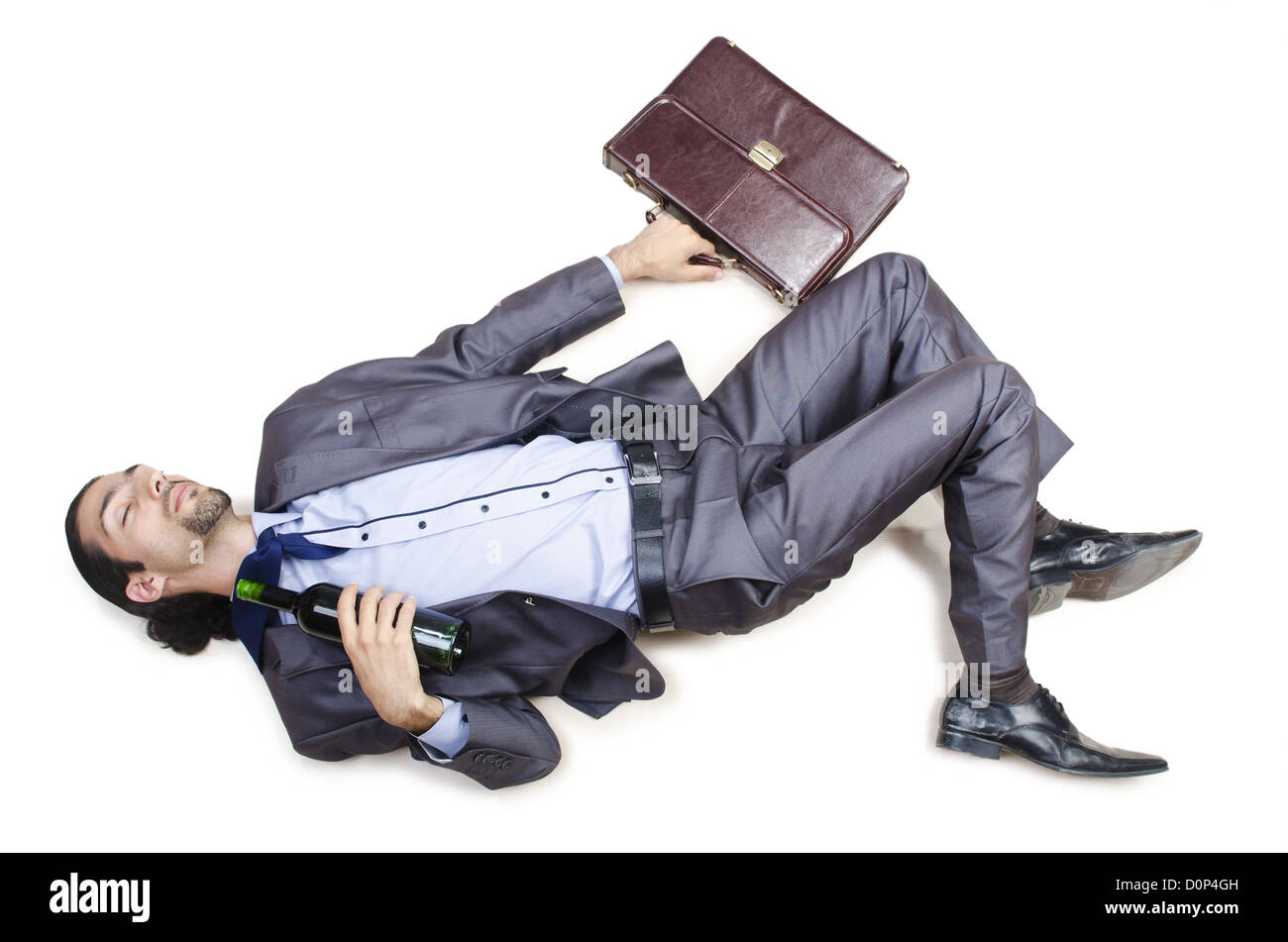 Drunk man lying on ground hi-res stock photography and images - Alamy