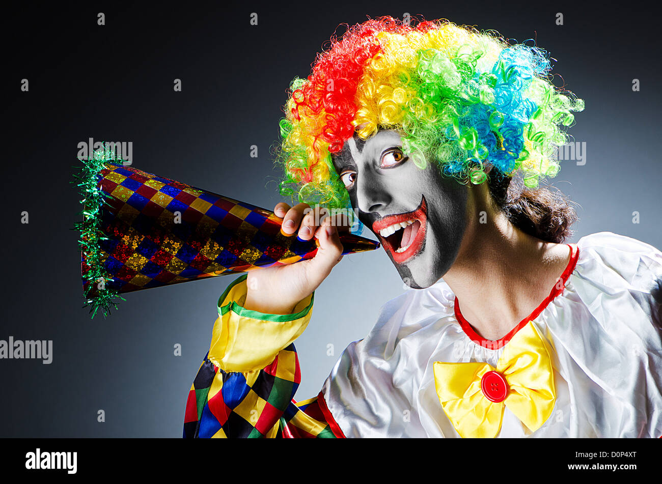 Funny clown in studio shooting Stock Photo - Alamy