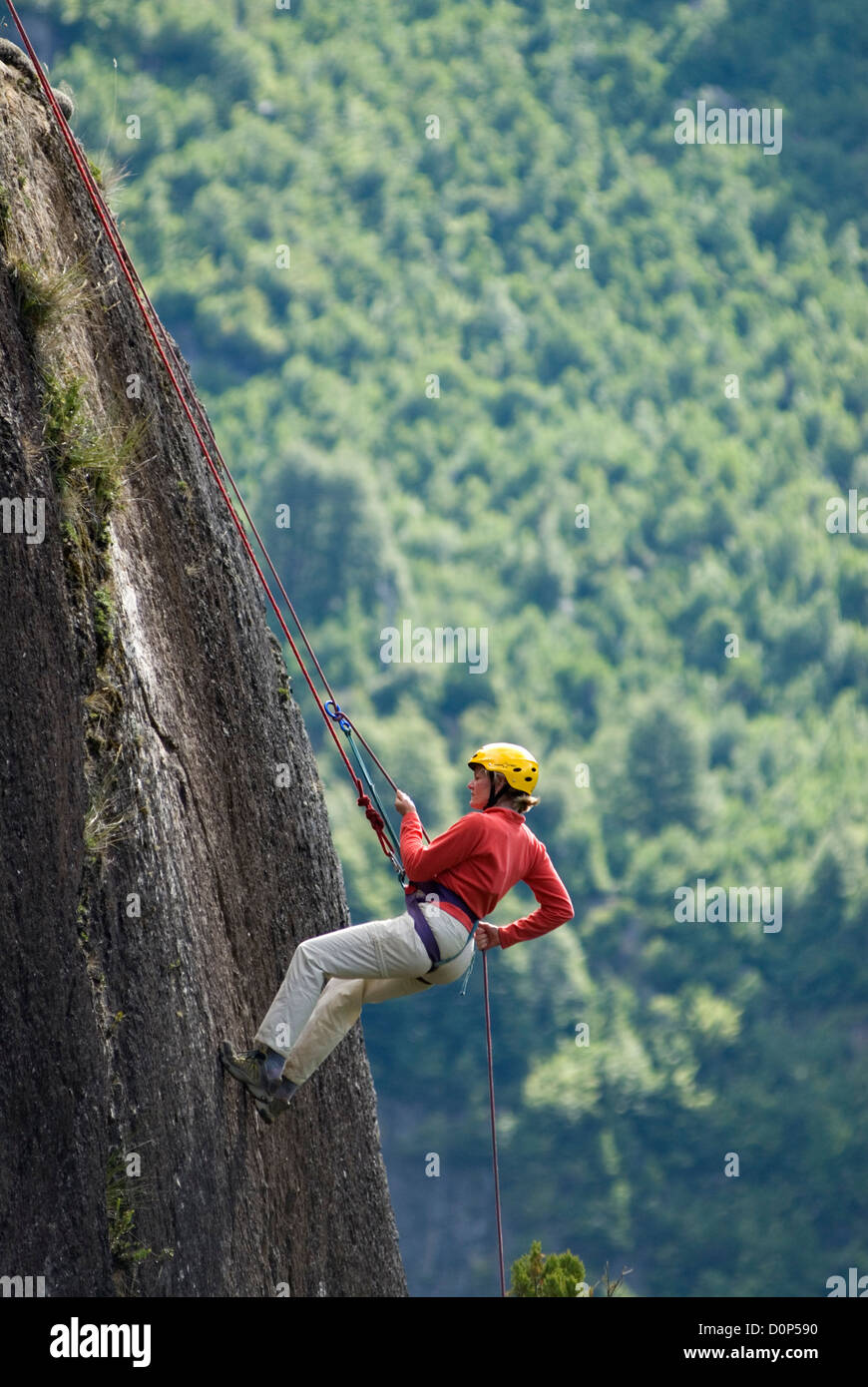 Rapelling down a cliff in Chile's Futaleufu River Valley Stock Photo ...