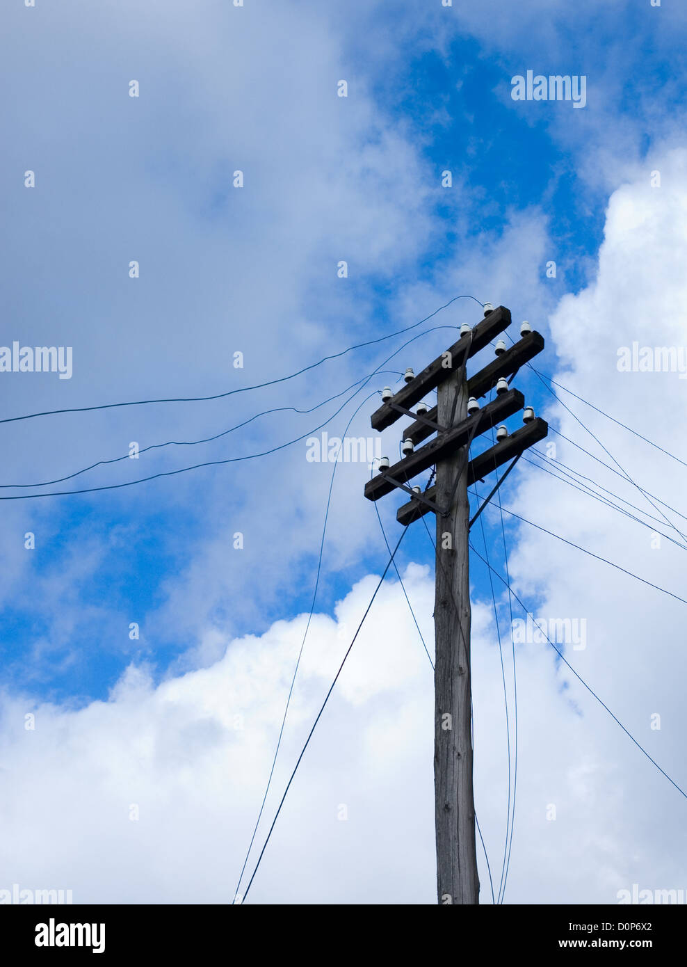 telegraph pole over blue sky background Stock Photo - Alamy