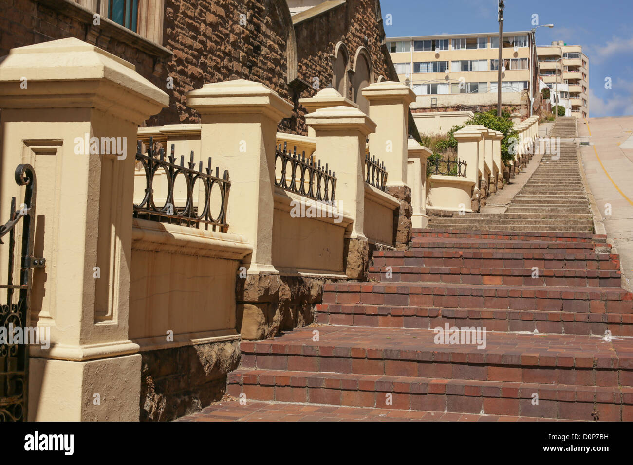 Long and steep pedestrian steps on the side of the road, leading up to ...