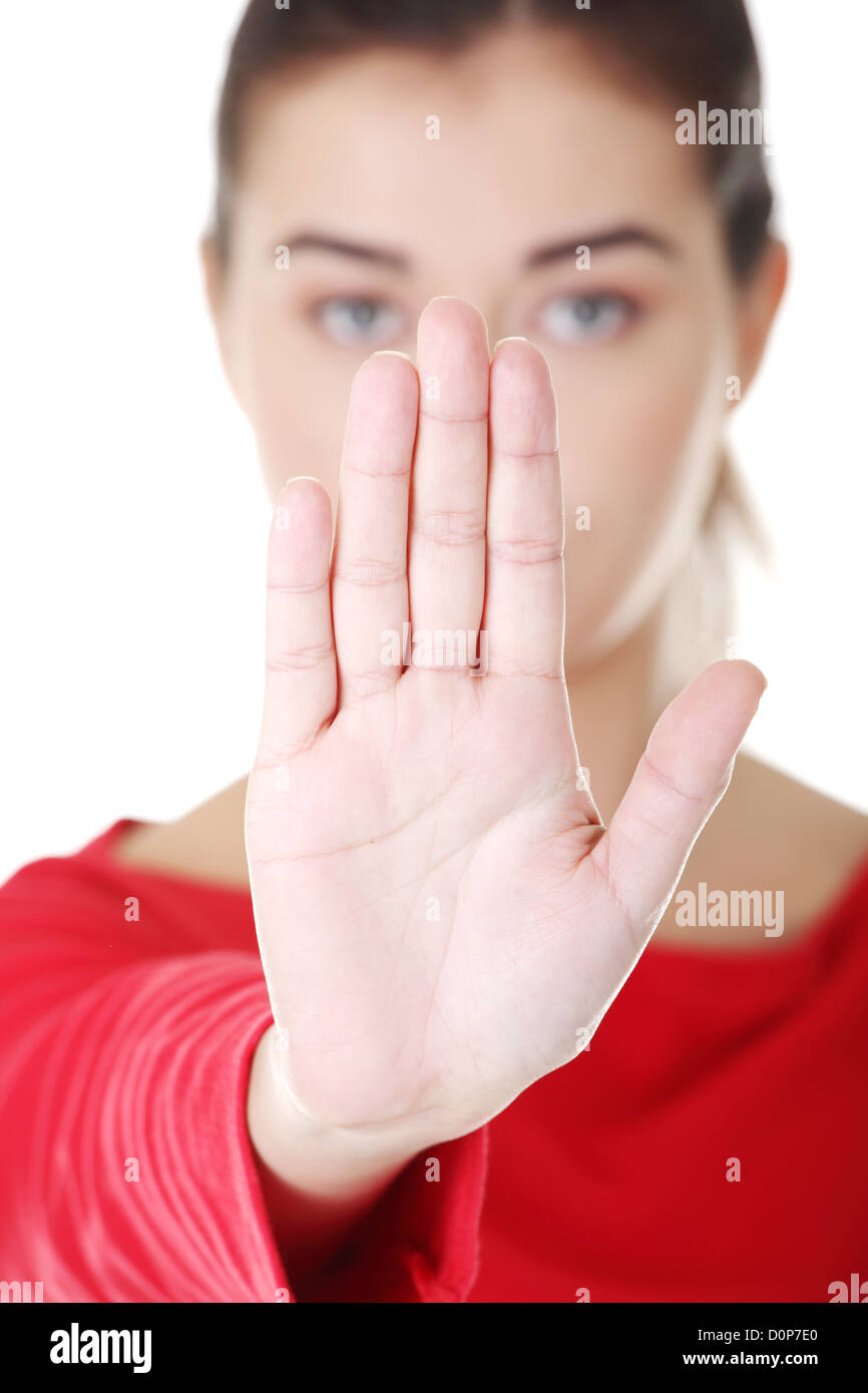 Confident woman making stop gesture sing with hand Stock Photo - Alamy