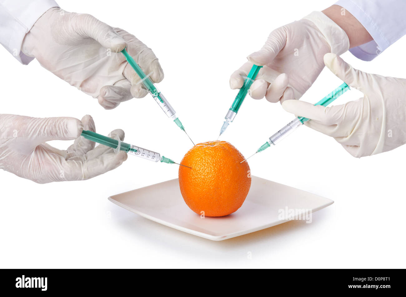 Science experiment with orange and syringe Stock Photo - Alamy