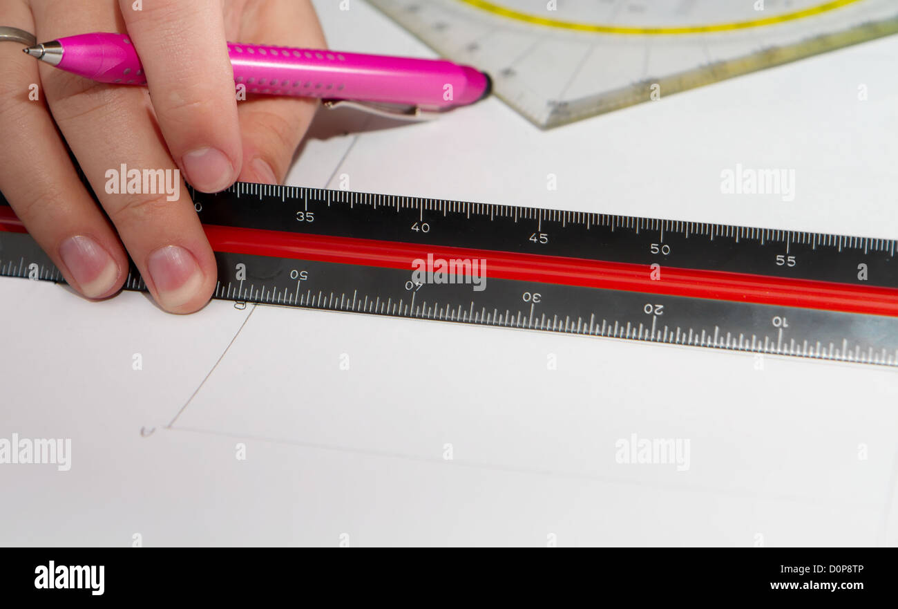 working with a pencil and ruler Stock Photo - Alamy