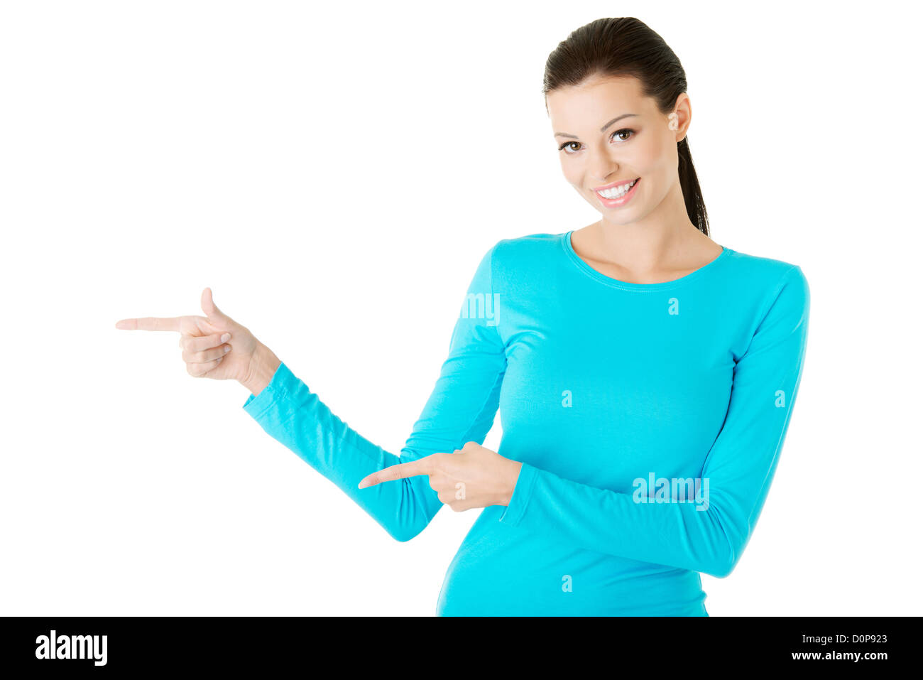 Happy , excited young woman pointing on copy space, isolated on white ...