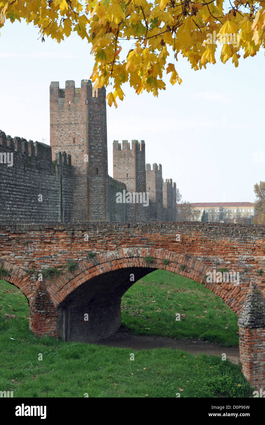 evocative bridge of an ancient medieval castle in autumn Stock Photo ...