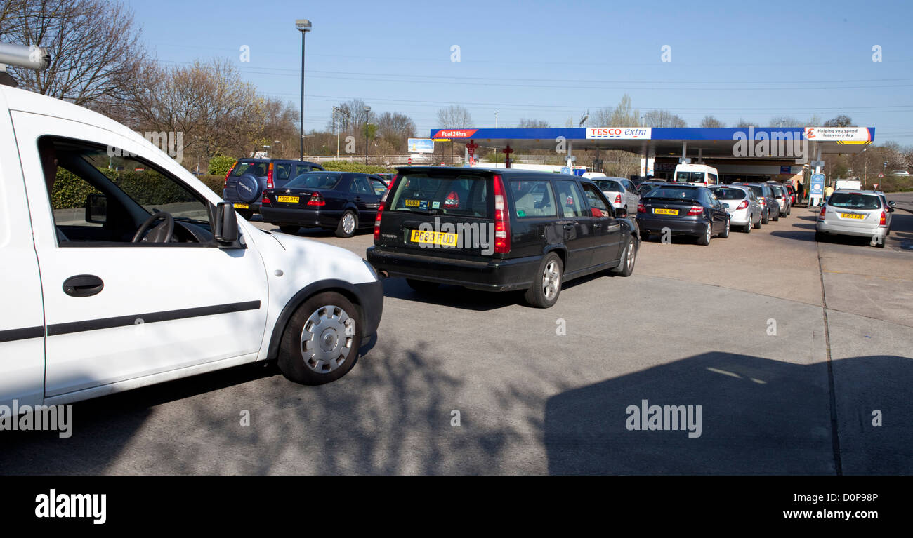 fuel crisis in uk, cars queue for fuel and petrol stations run out of ...