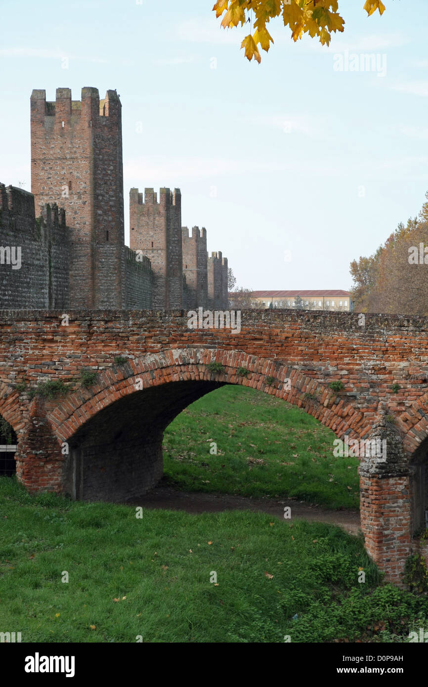 old red brick bridge to access the medieval castle Stock Photo - Alamy