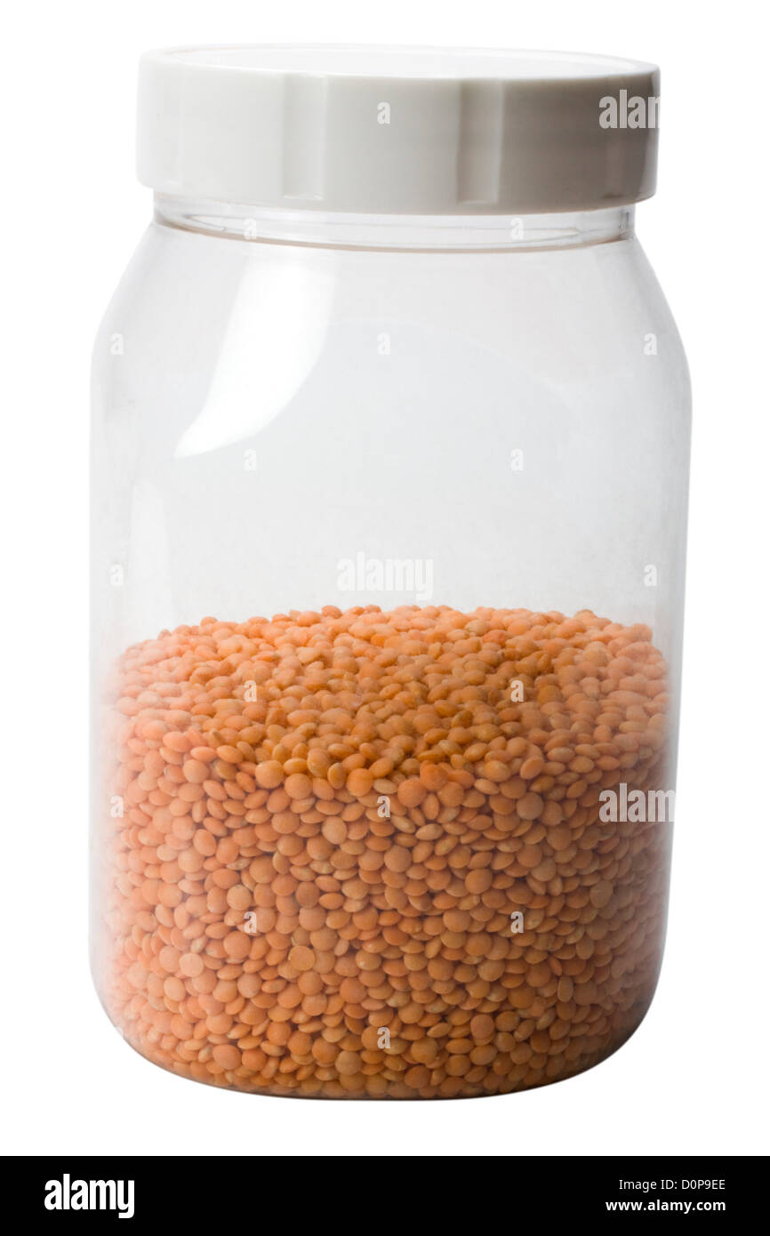Close-up of red lentil in a plastic jar Stock Photo - Alamy