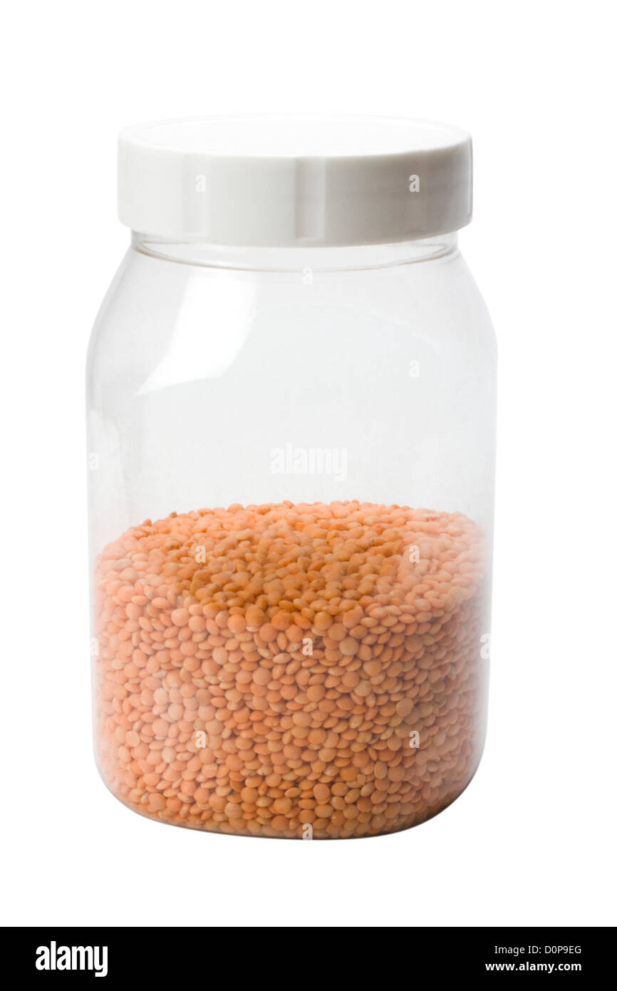 Close-up of red lentil in a plastic jar Stock Photo - Alamy