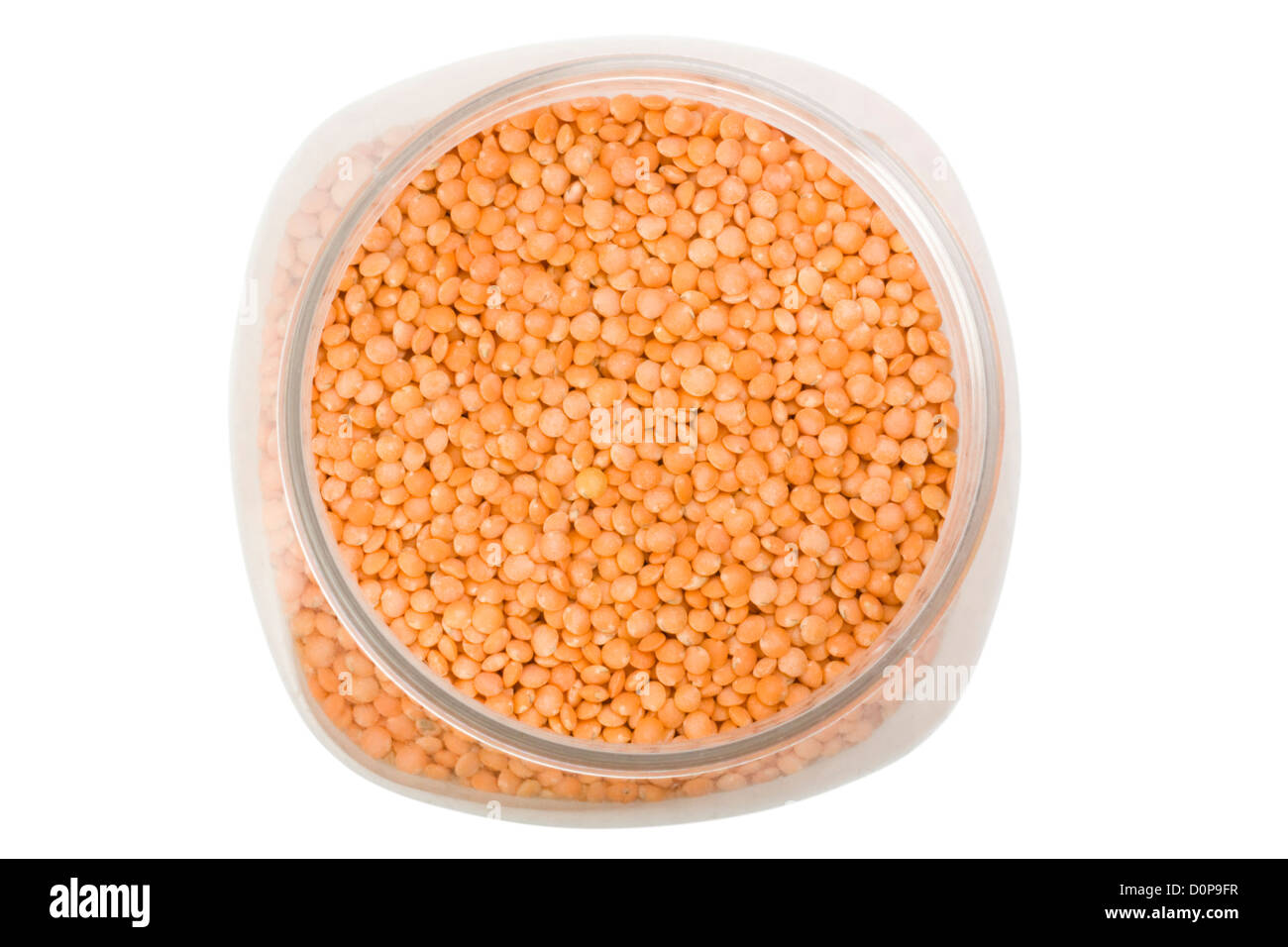 Close-up of red lentil in a plastic jar Stock Photo - Alamy