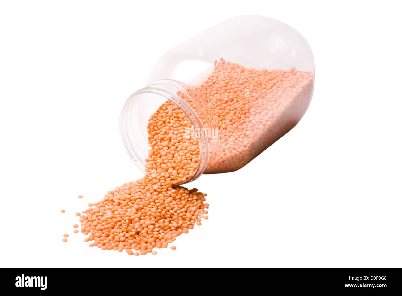 Close-up of red lentil spilling from a jar Stock Photo - Alamy