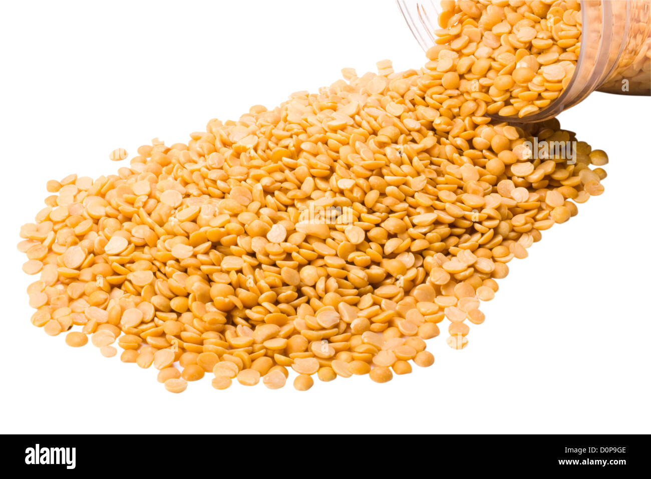 Close-up of pigeon pulses spilling from a jar Stock Photo - Alamy