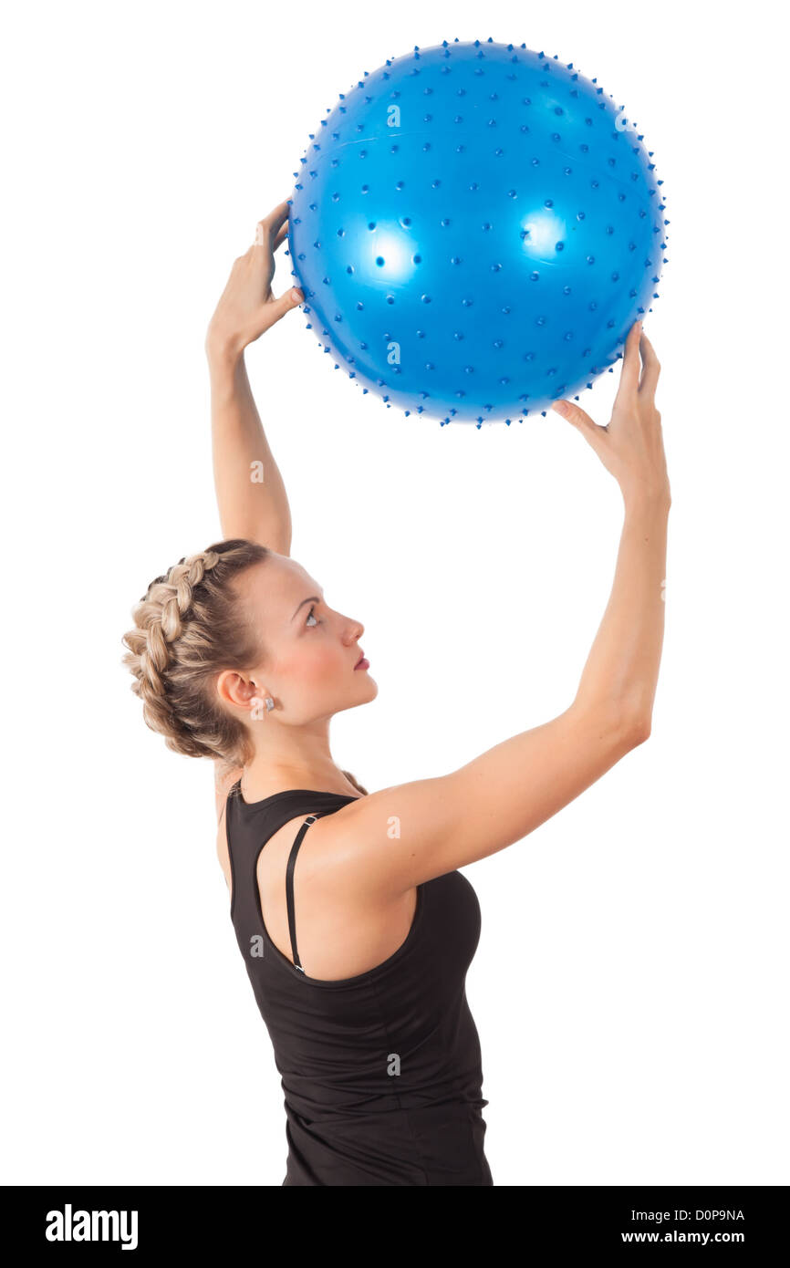 Athletic young woman with blue ball Stock Photo - Alamy