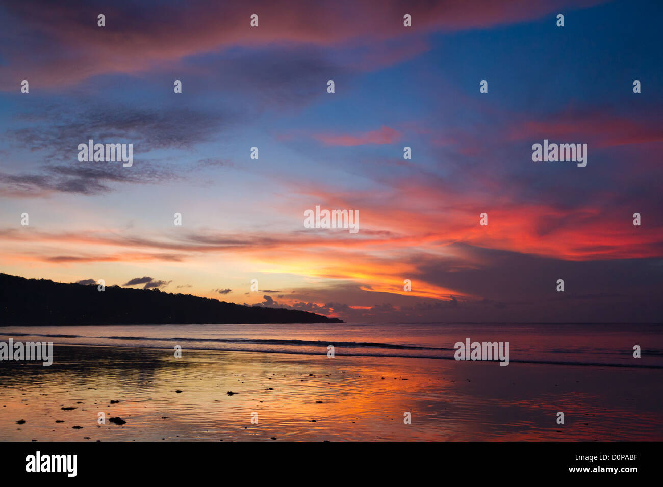 Sunset on the Beach of Jimbaran on Bali, Indonesia Stock Photo - Alamy